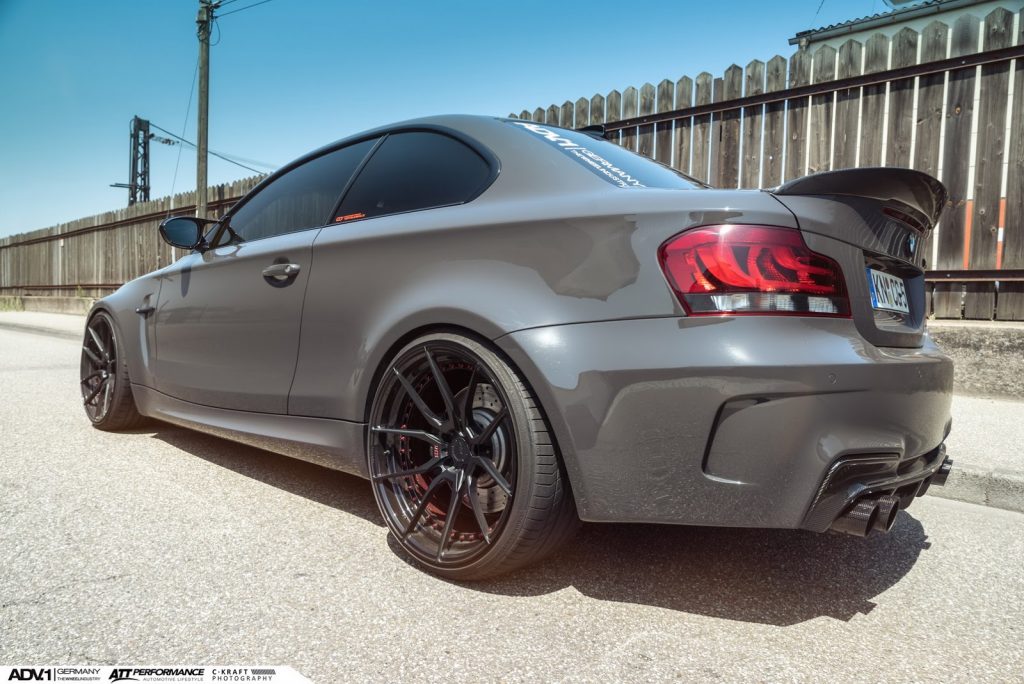 This BMW 1M Looks Simply Ferocious On Matte Black Rims | Carscoops