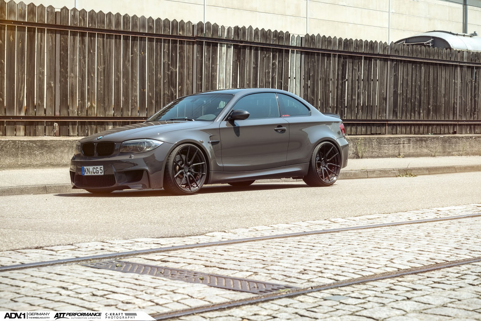 This BMW 1M Looks Simply Ferocious On Matte Black Rims | Carscoops