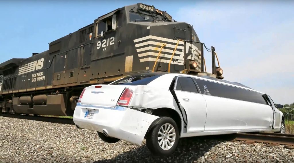 Watch A Train Crash Into A Stuck Chrysler Limo In Indiana | Carscoops