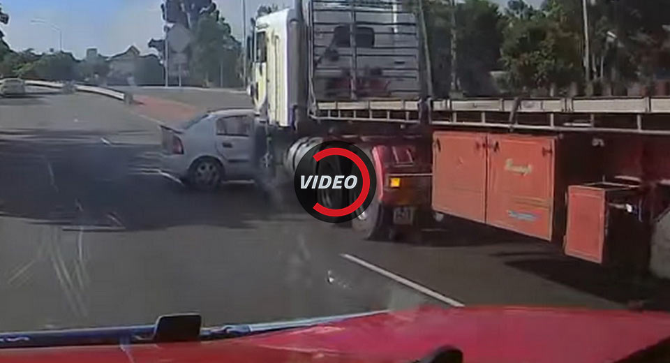 Semi Truck Fails To Notice Car While Changing Lanes, Accident Ensues ...