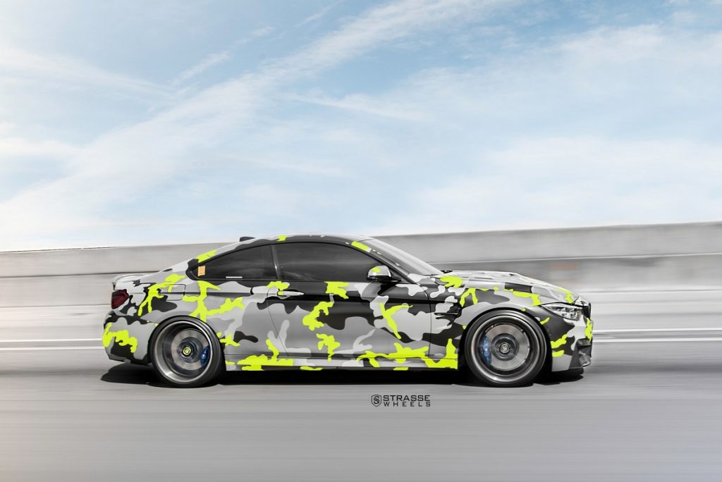 BMW M4 Coupe Gets A Colorful Camo Wrap And New Wheels | Carscoops