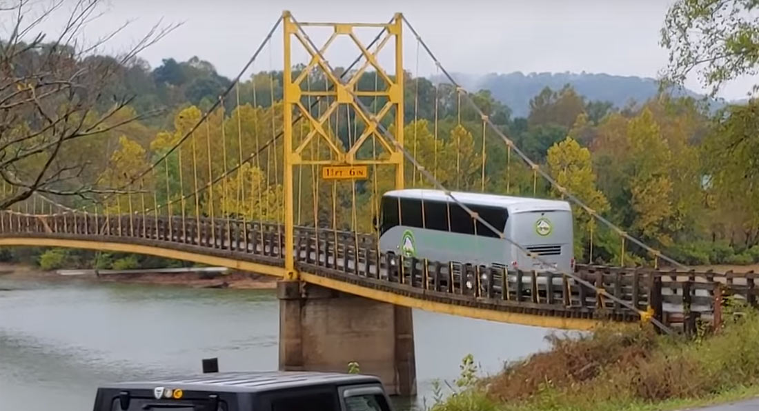 35 Ton Bus Ignores Weight Limit Bending Old Suspension Bridge | Carscoops