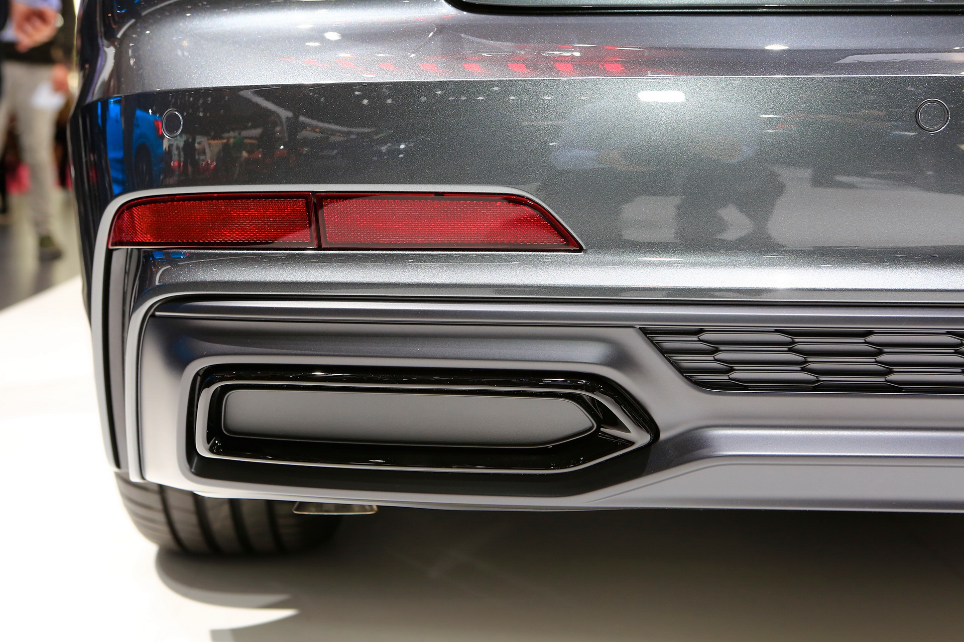 The Fake Exhaust Holes Of The Paris Auto Show Floor | Carscoops