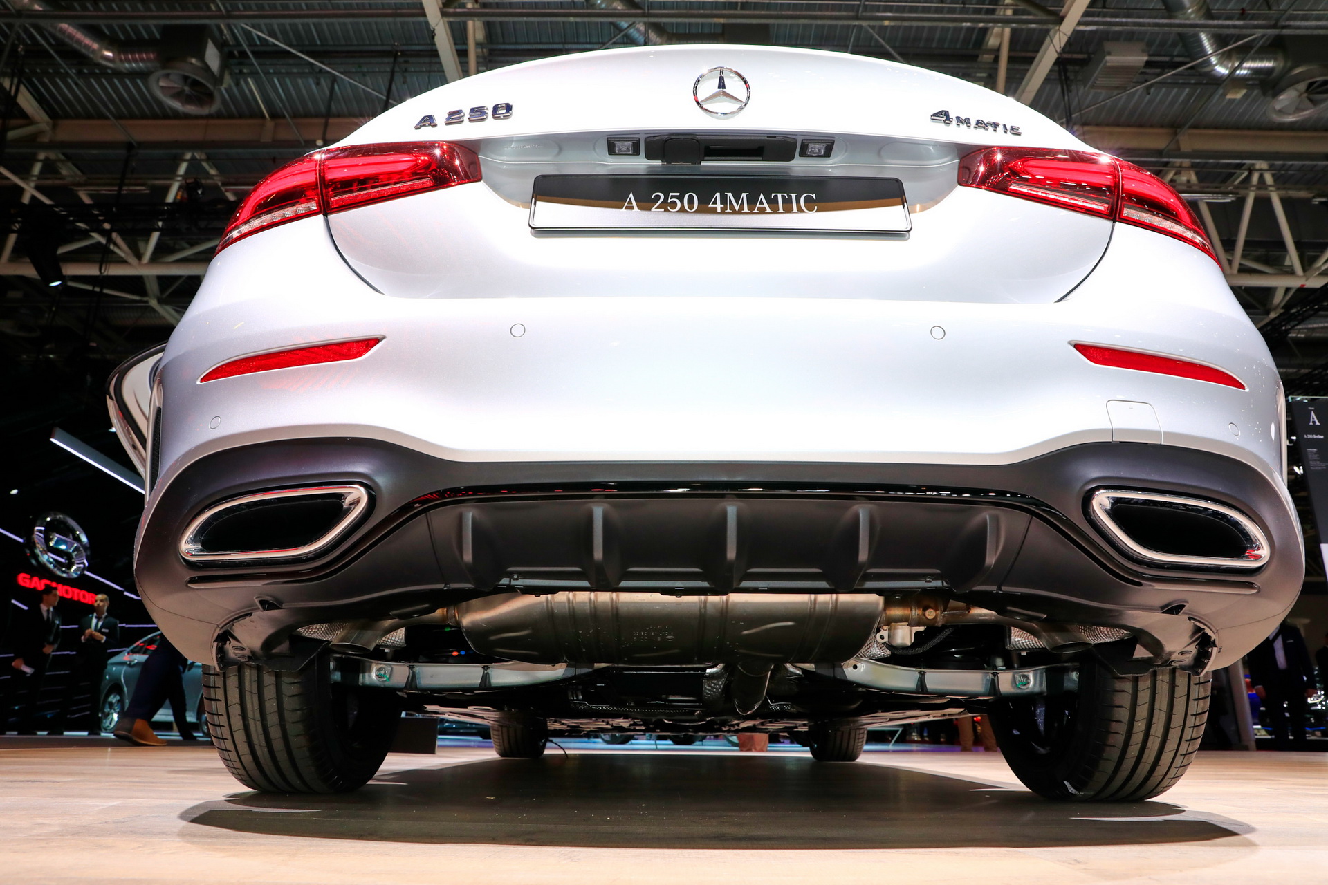 The Fake Exhaust Holes Of The Paris Auto Show Floor | Carscoops
