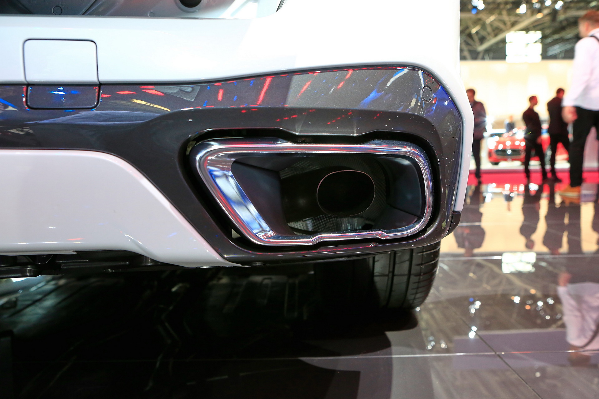 The Fake Exhaust Holes Of The Paris Auto Show Floor | Carscoops