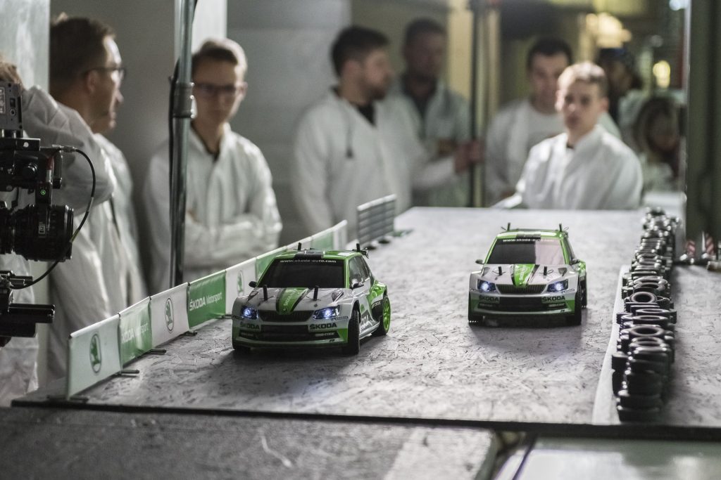 Watch A Couple Of Tiny Rally Cars Race Through Skoda’s Factory | Carscoops
