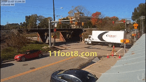 This Truck Driver Hit Two Low Clearance Bridges Within Minutes! | Carscoops
