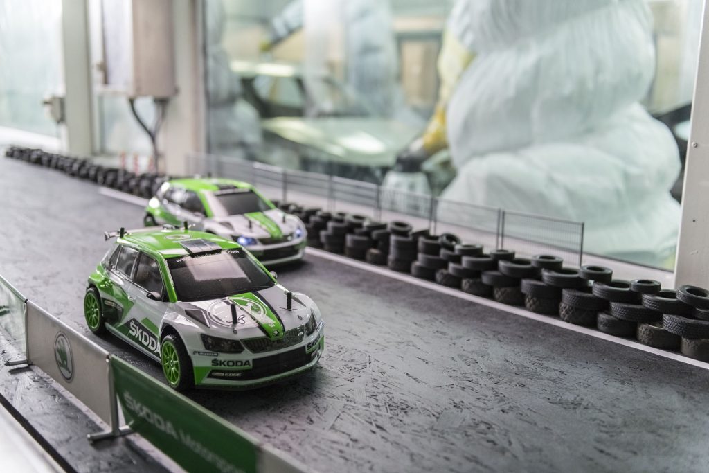 Watch A Couple Of Tiny Rally Cars Race Through Skoda’s Factory | Carscoops