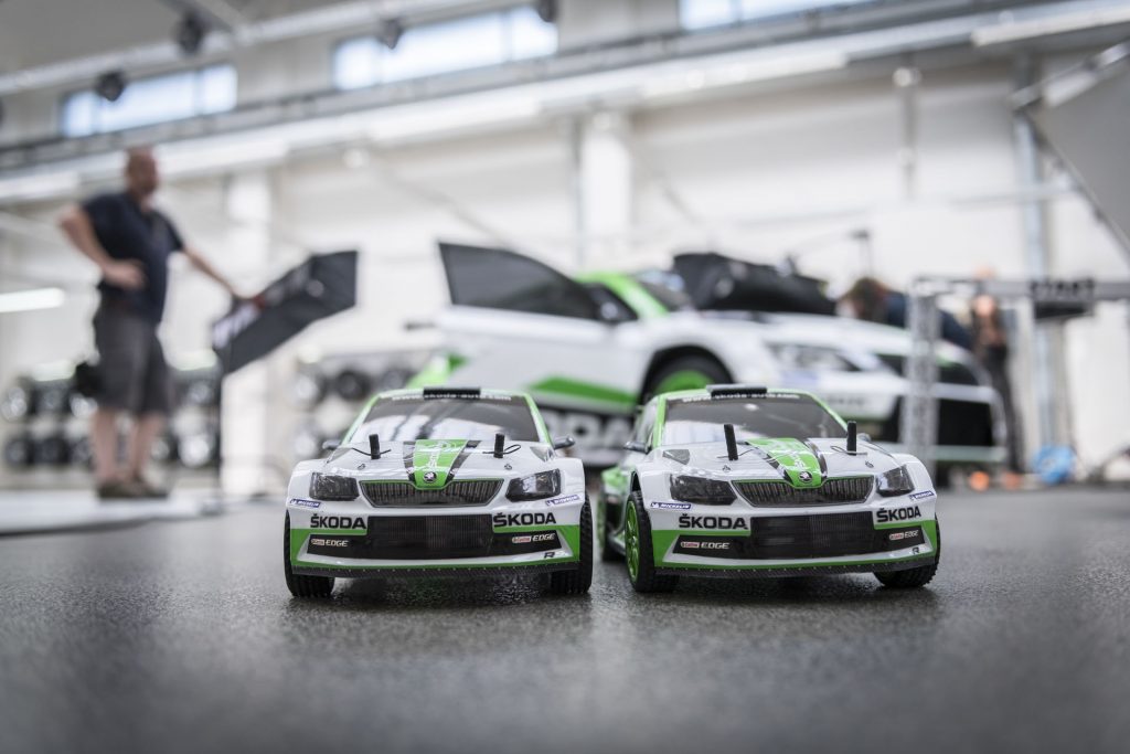 Watch A Couple Of Tiny Rally Cars Race Through Skoda’s Factory | Carscoops