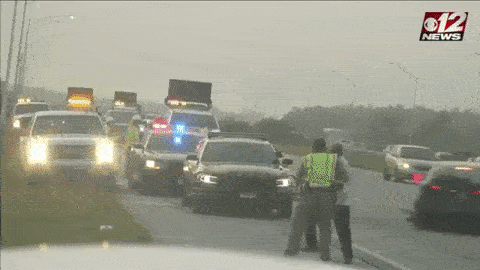 Florida Highway Patrolman Pushes Witness Out Of The Way Of Oncoming ...