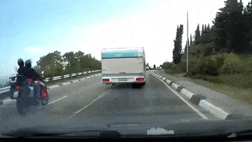 Biker Commits Epic Overtaking Blunder, Is Lucky To Survive | Carscoops