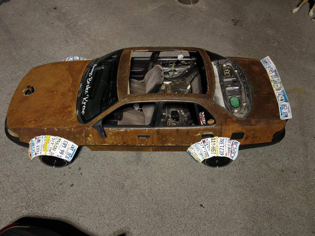 This Rusted Toyota Camry Has Fender Flares Made From License Plates ...