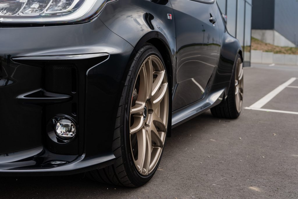 Bronze Wheels Complete This Blacked-Out Toyota GR Yaris | Carscoops