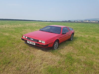 For $37,000, You Can Ride This Rare Red-Painted DeLorean All The Way ...