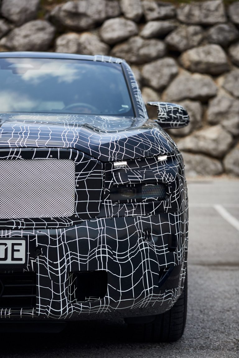 BMW XM Spotted At An Airport With Less Camo, Lots Of Grille | Carscoops