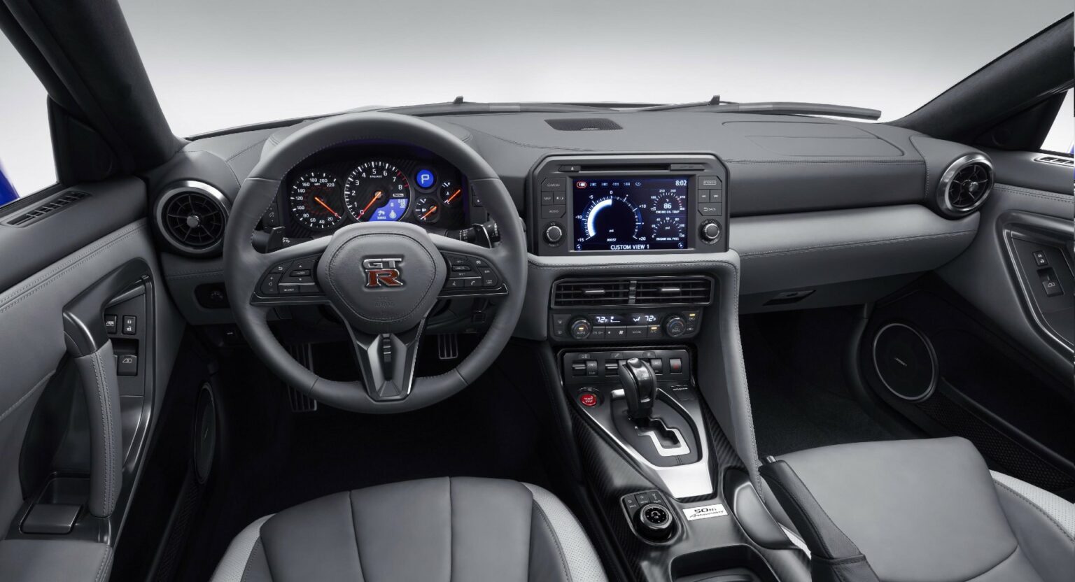 What Sports Car Has The Most Mundane Looking Instrument Panel? | Carscoops