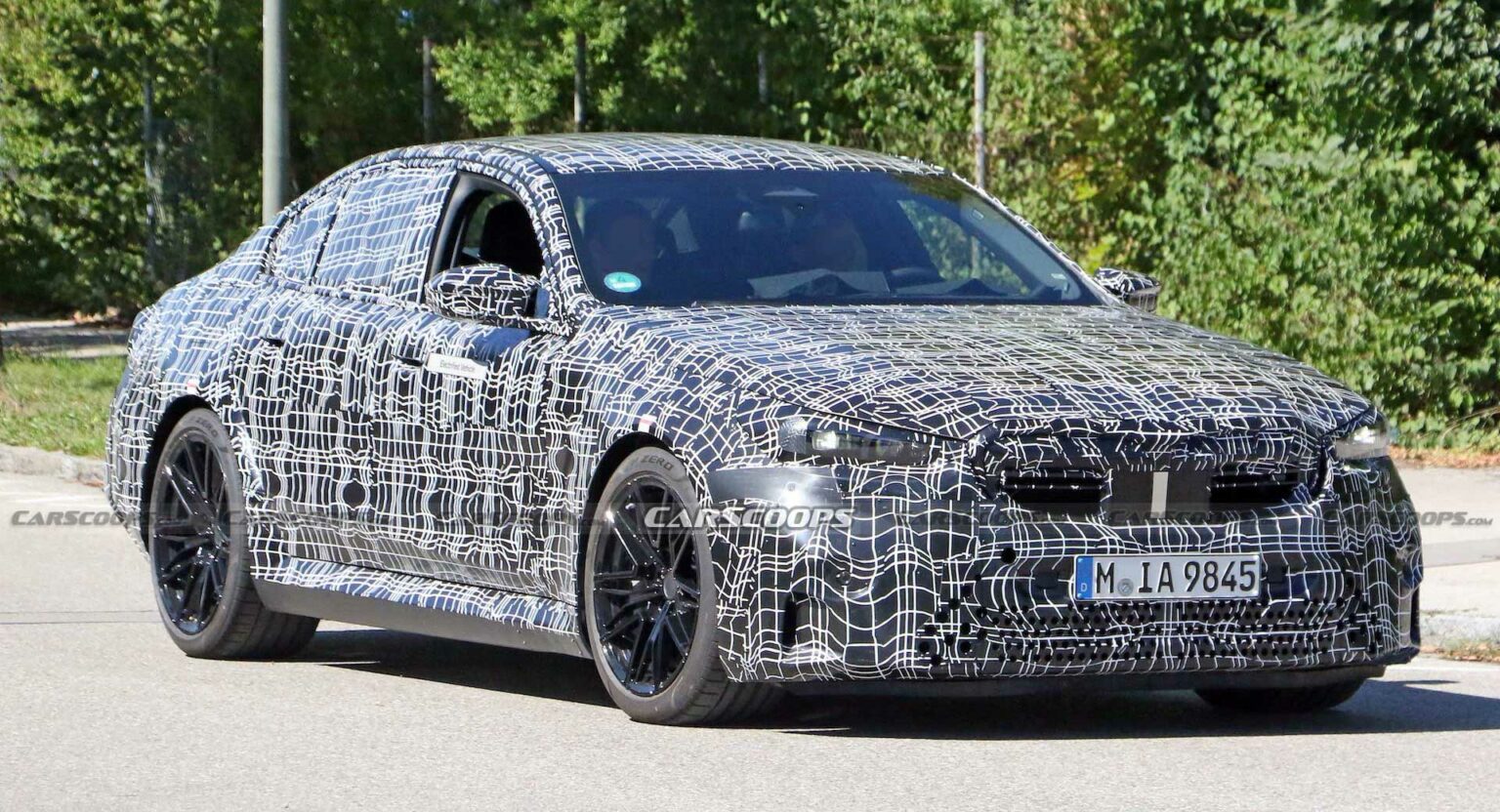 2024 BMW M5 Hybrid Prototype Drops Arch Flares, Shows Glimpse Of M4 CSL ...