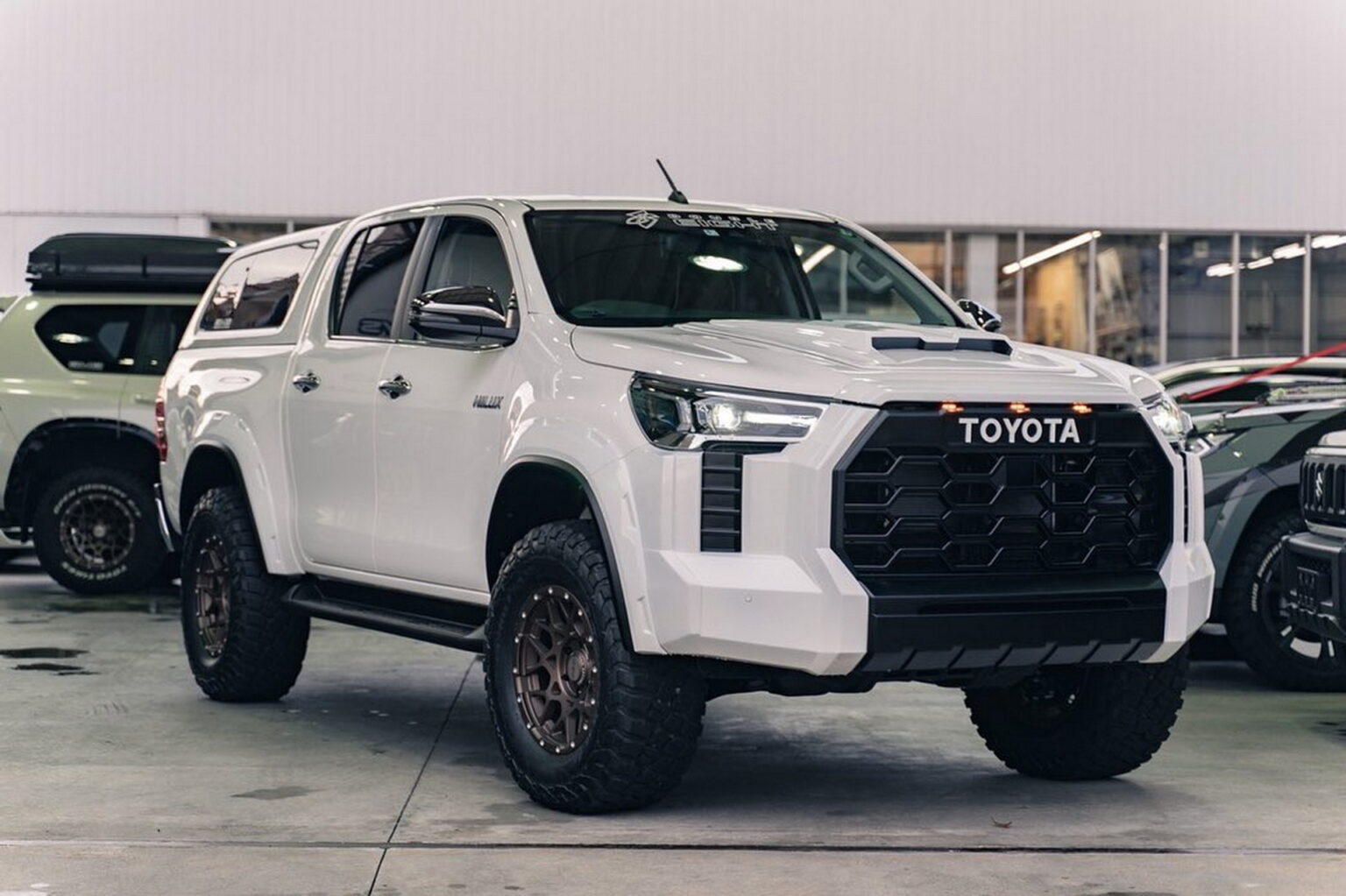 Toyota Hilux Gets A Tundra Face Transplant By Japanese Tuner GMG Double ...