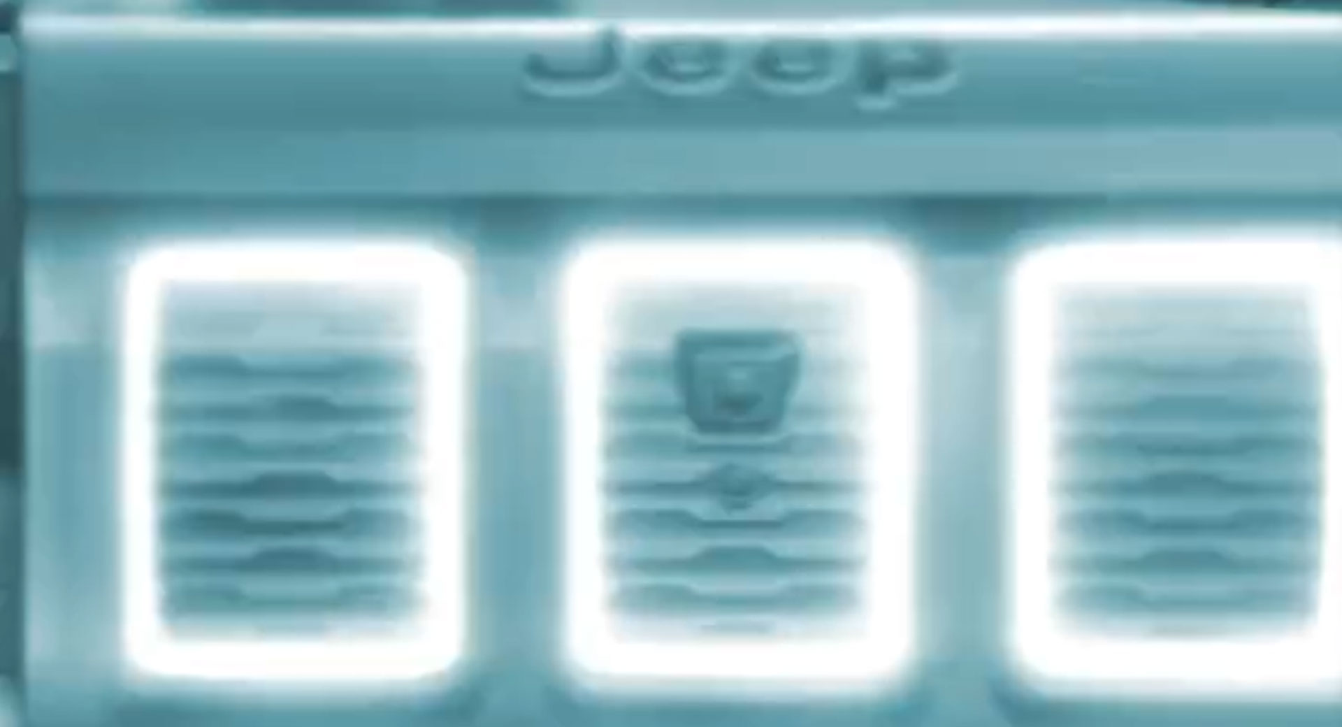 Jeep Appears To Be Teasing A New EV With An Illuminated Seven-Slot ...