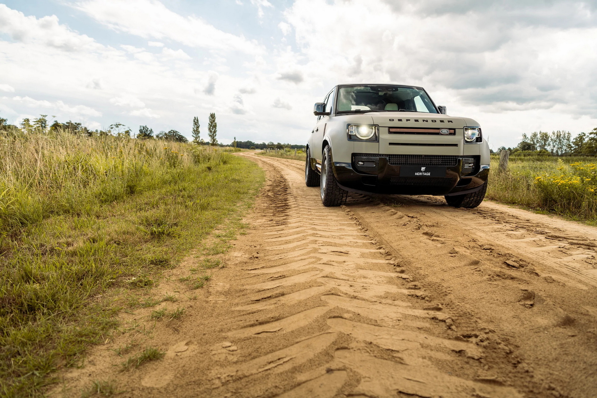 Land Rover Defender Looks Retrotastic With Rock Dust Wheels By Heritage ...