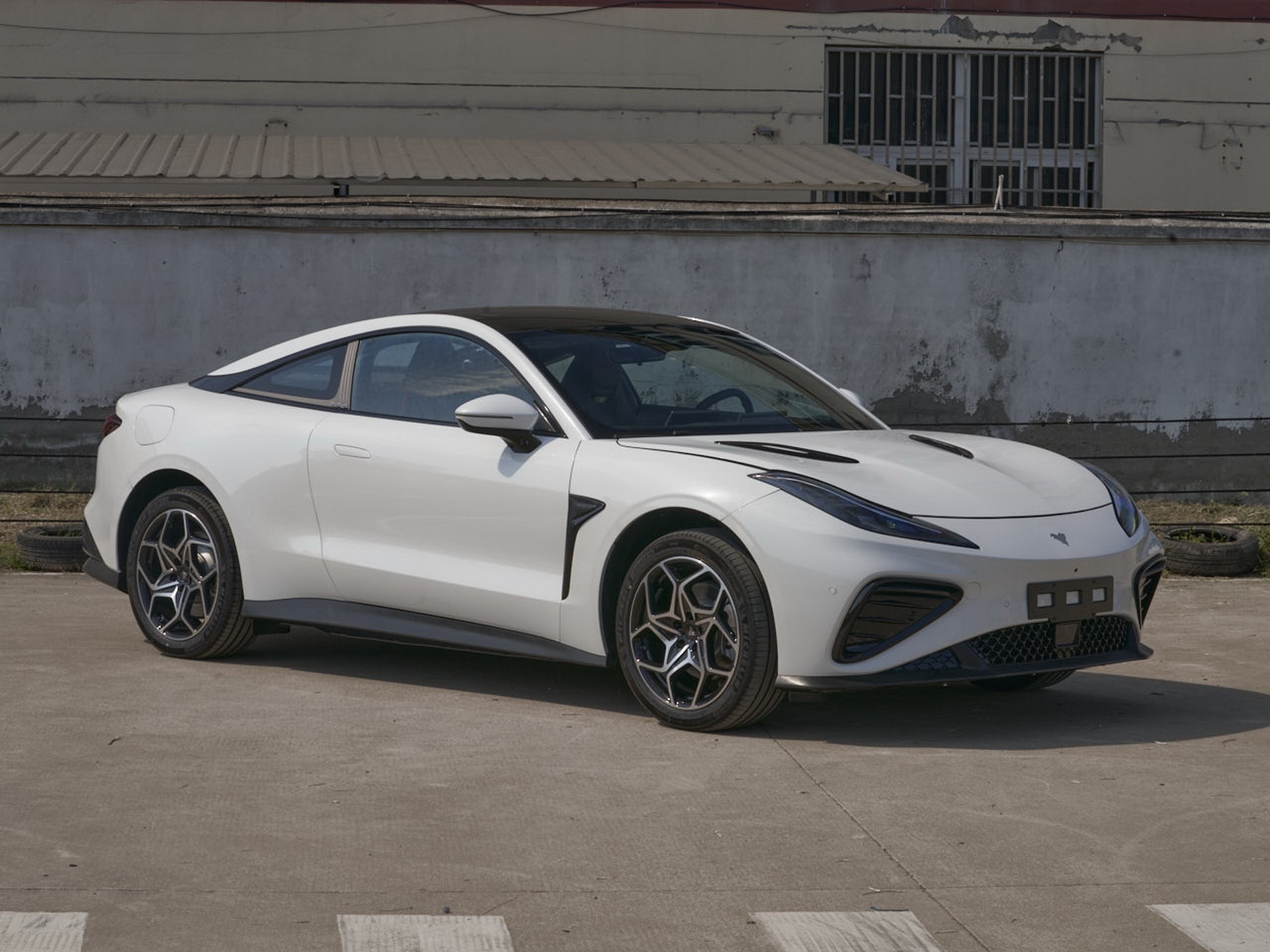 New Nezha E Is A Chinese Coupe With Dual Electric Motors And A C8 Meets ...