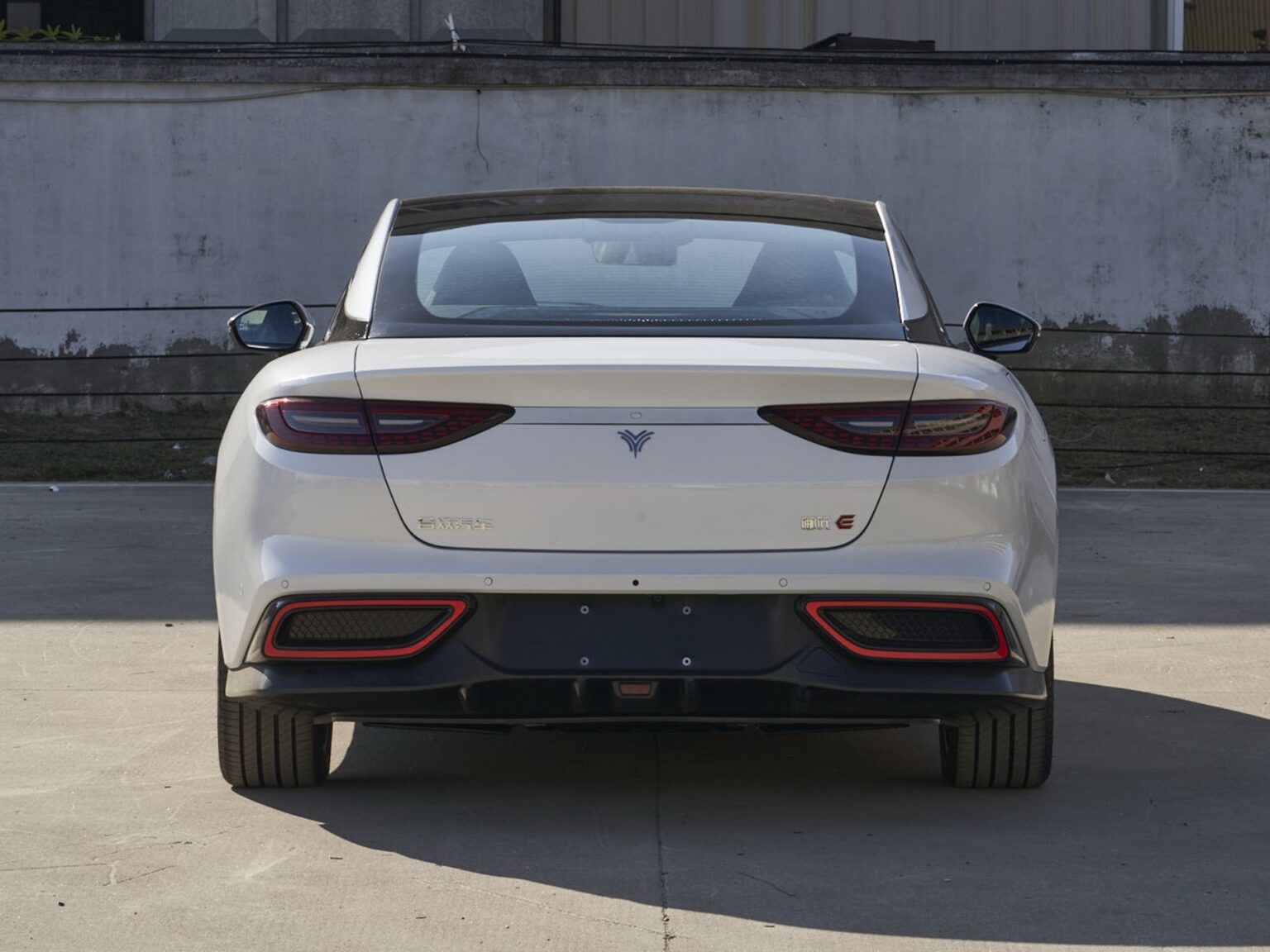 New Nezha E Is A Chinese Coupe With Dual Electric Motors And A C8 Meets ...