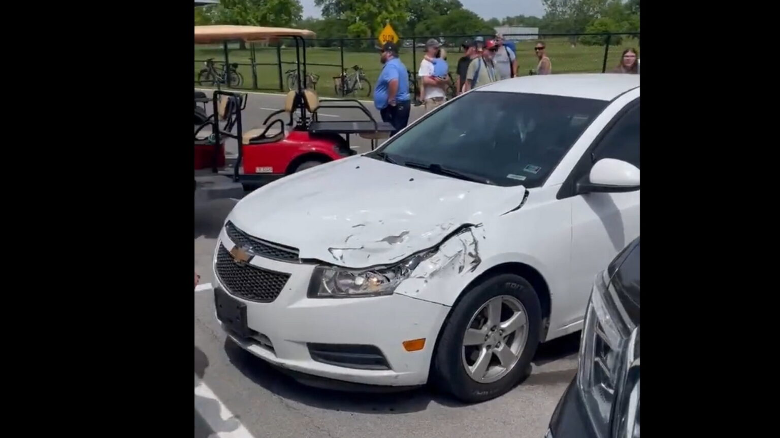 Wrecked Racecar’s Wheel Goes Flying Over Crowd, Smashes Into Parked Car ...