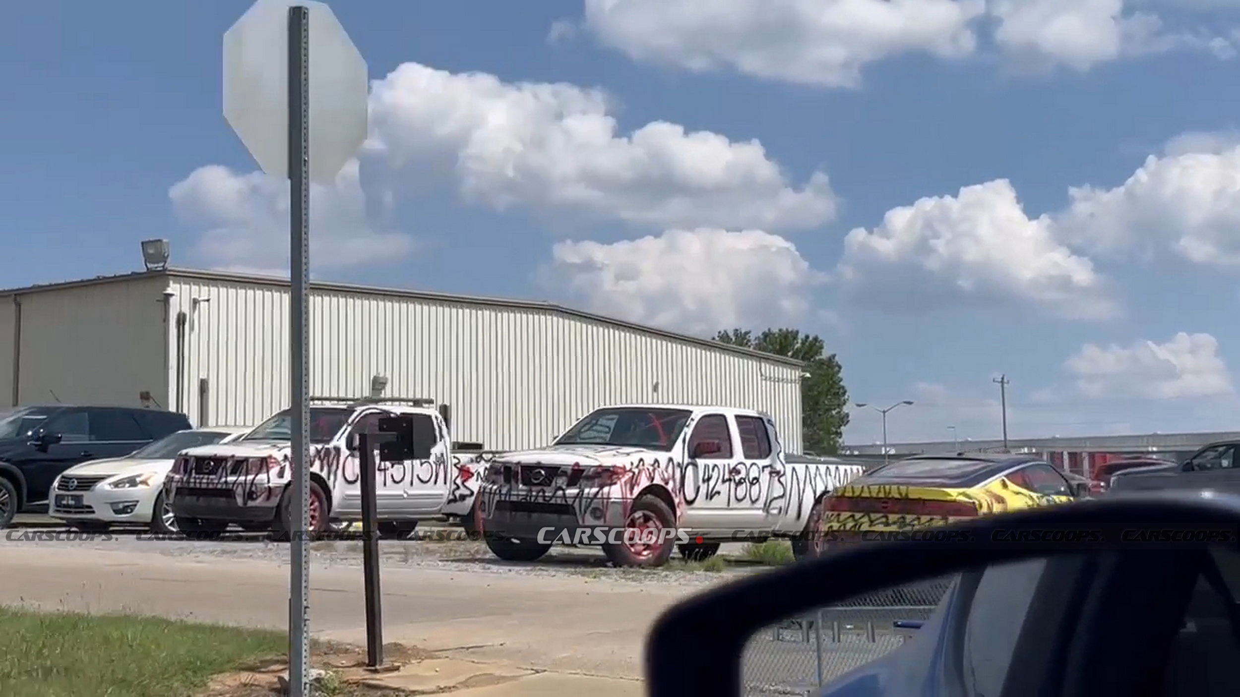 The Mystery Behind Those Spray-Painted Nissan Z And Frontiers Is ...