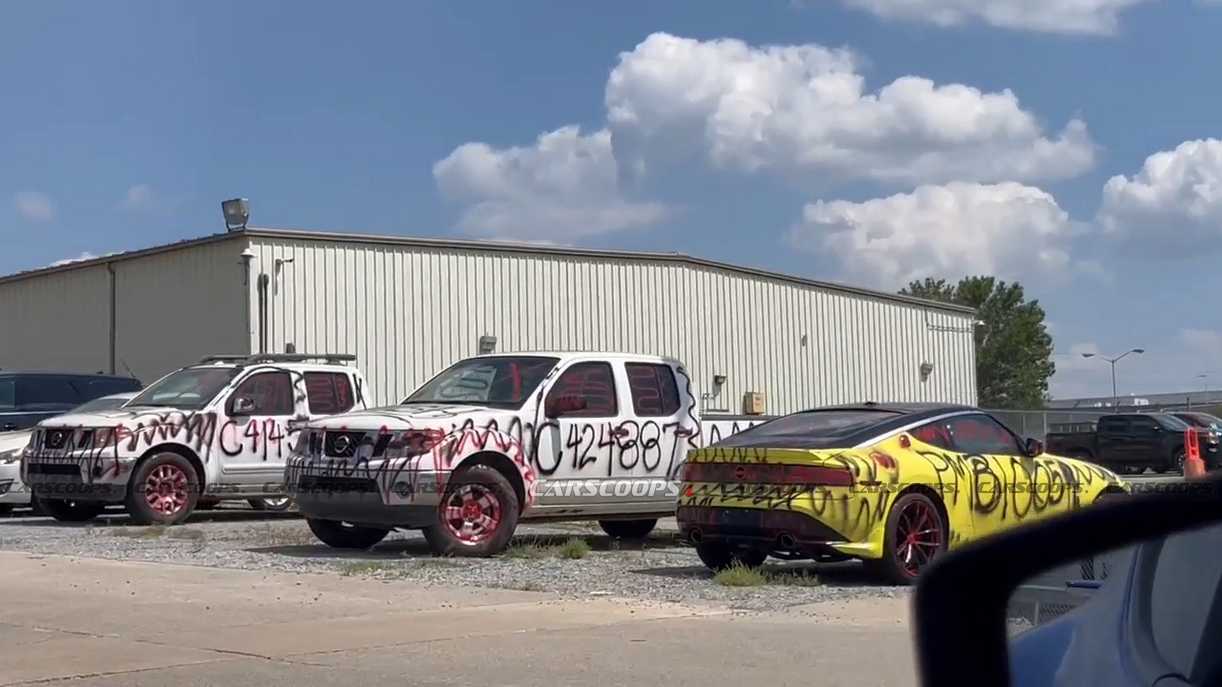 The Mystery Behind Those Spray-Painted Nissan Z And Frontiers Is ...