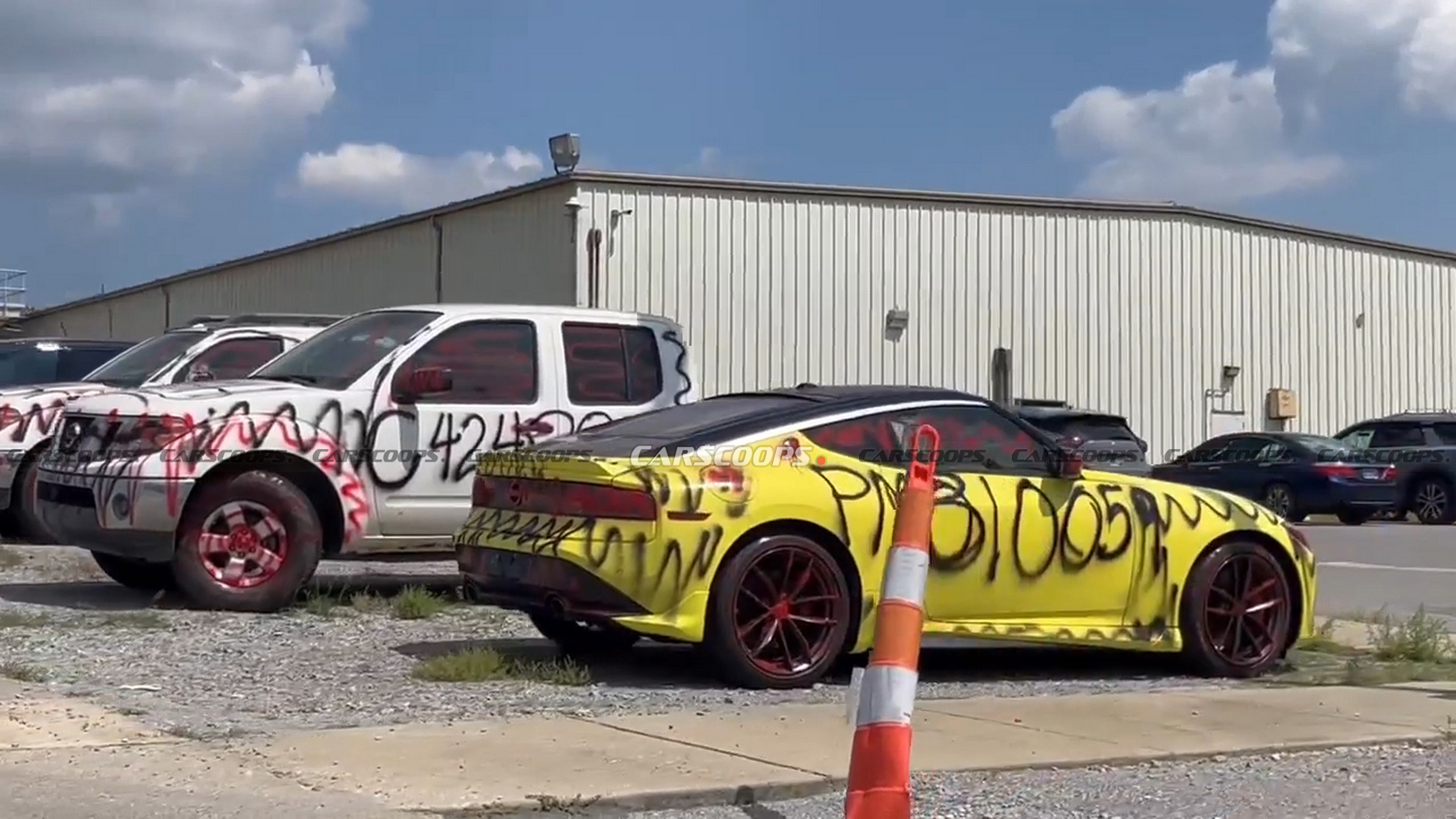 The Mystery Behind Those Spray-Painted Nissan Z And Frontiers Is ...
