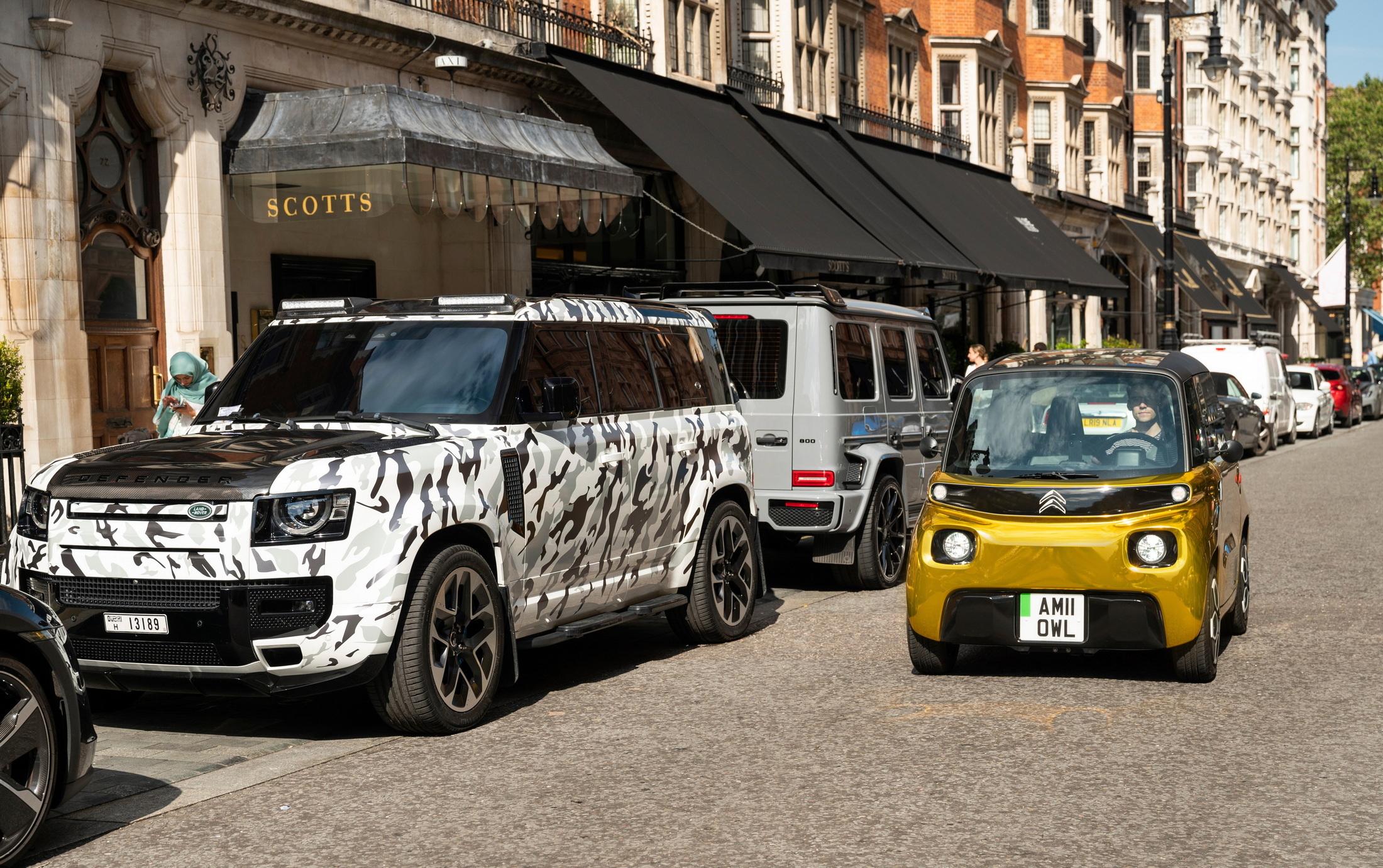 Gold-Wrapped Citroen Ami Photobombs Supercars In London | Carscoops
