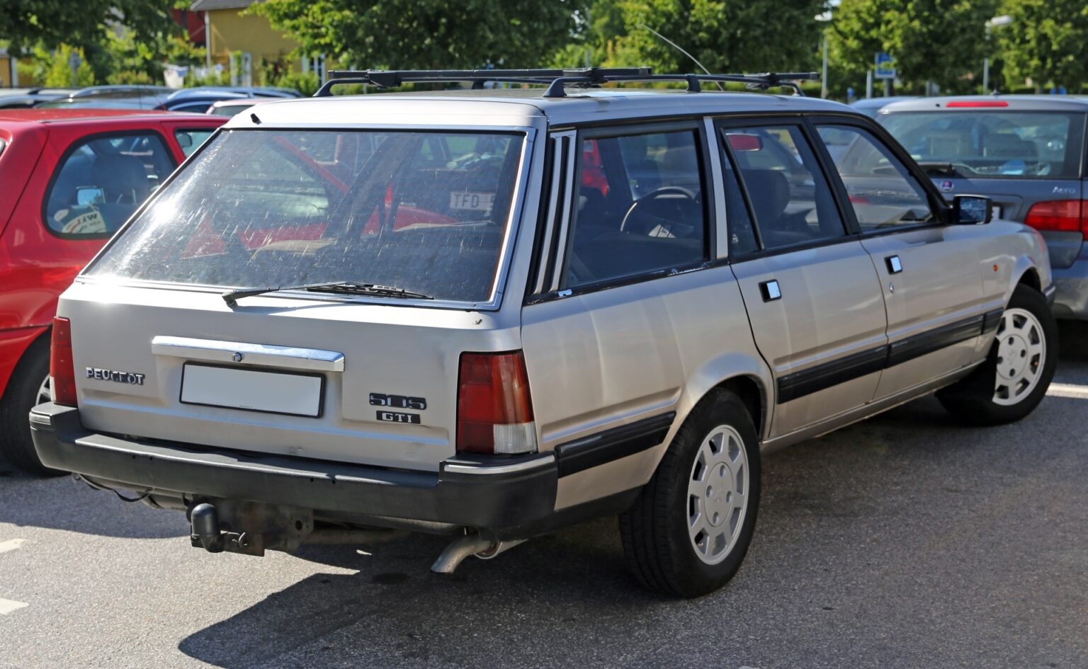 How The Humble Peugeot 505 Saved The Aston Martin Vantage | Carscoops