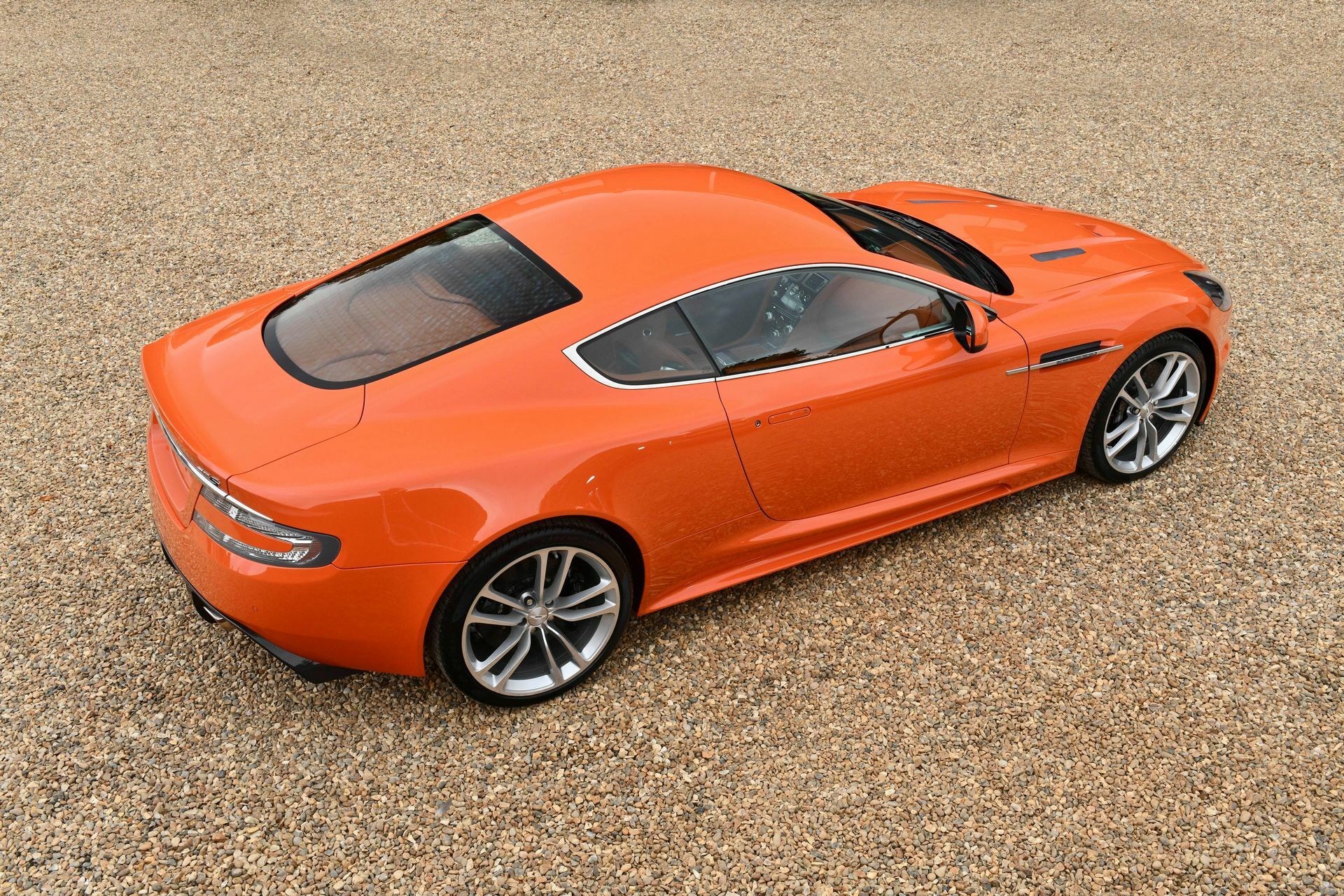 All-Orange Aston Martin Collection Is So 2010 | Carscoops