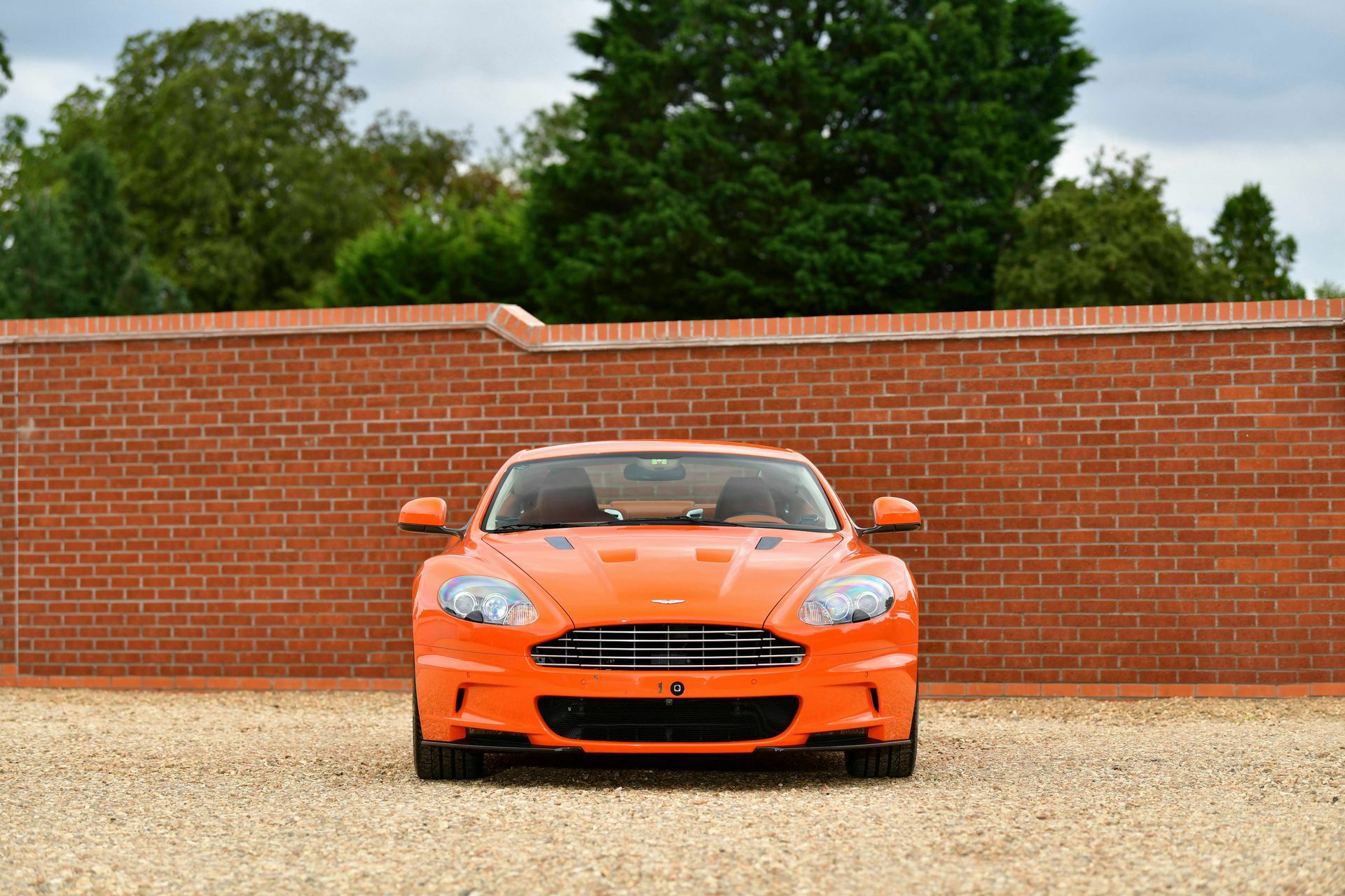 All-Orange Aston Martin Collection Is So 2010 | Carscoops