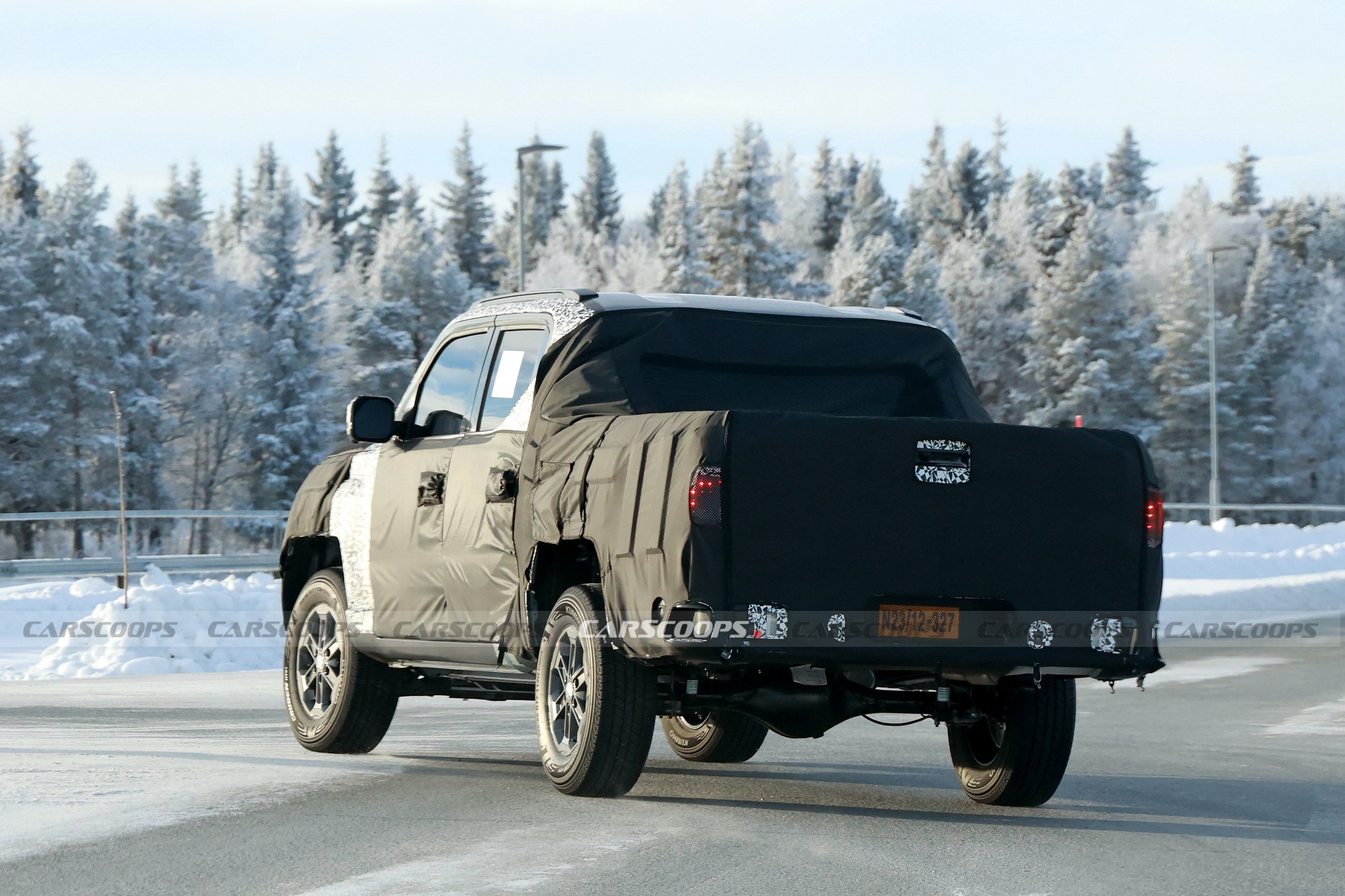 New Kia Tasman Pickup Spied Testing With Ford Ranger Raptor | Carscoops