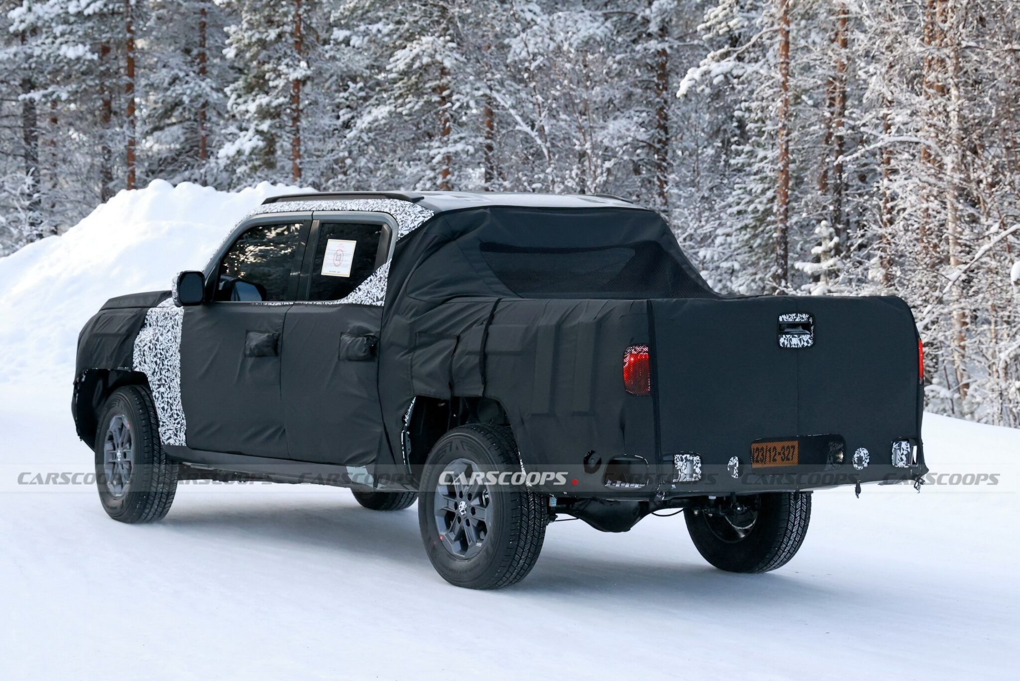 New Kia Tasman Pickup Spied Testing With Ford Ranger Raptor | Carscoops
