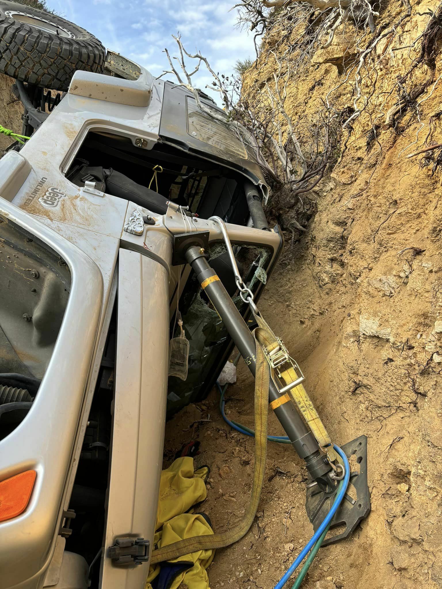 Jeep Takes A Tumble And Traps Driver On Remote Off-Road Trail Sparking ...