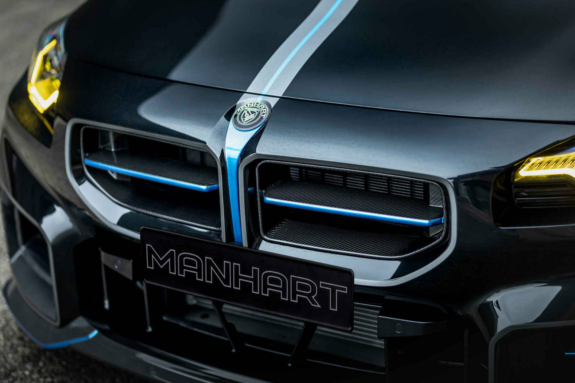 Manhart’s 552-HP BMW M2 Looks Sinister With Carbon Bits And 21-Inch ...
