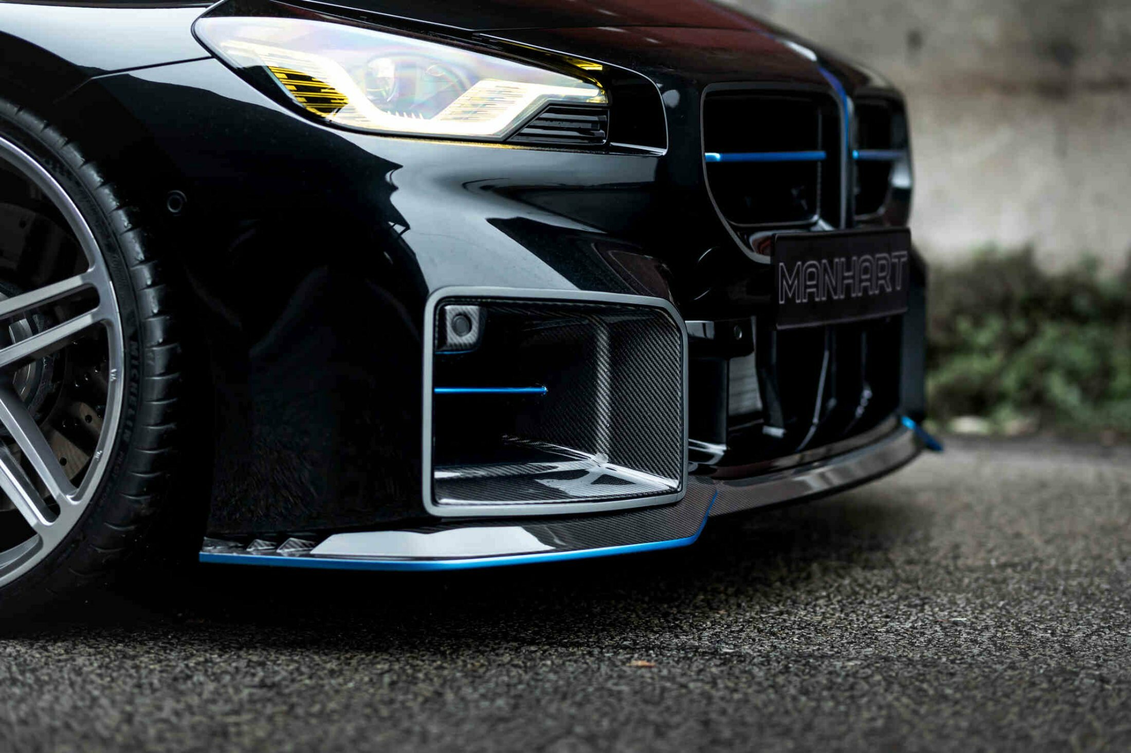 Manhart’s 552-HP BMW M2 Looks Sinister With Carbon Bits And 21-Inch ...