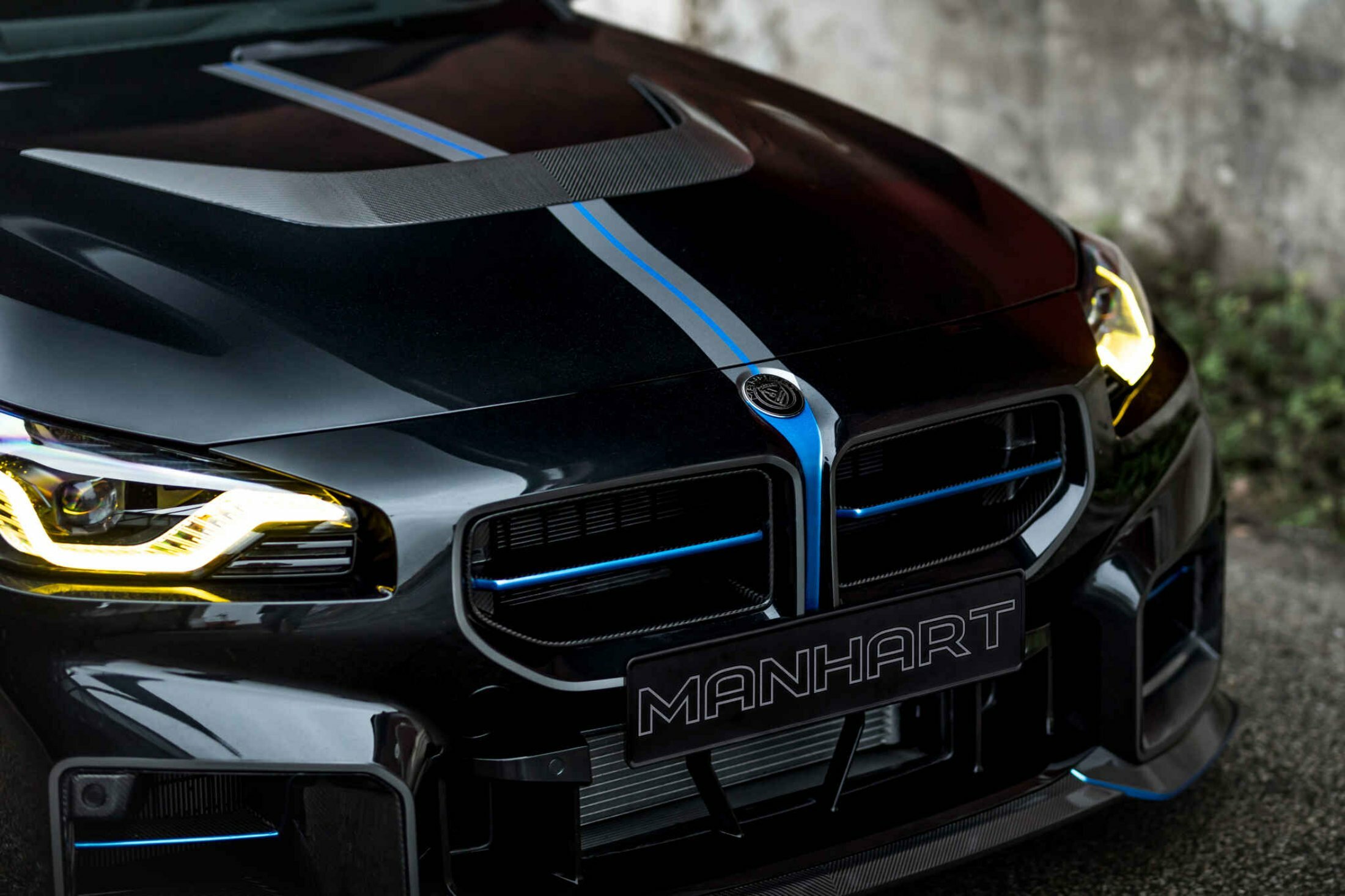 Manhart’s 552-HP BMW M2 Looks Sinister With Carbon Bits And 21-Inch ...