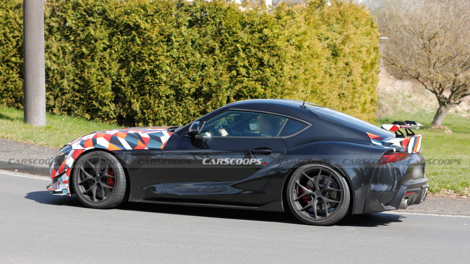 2025 Toyota Supra GRMN Spotted With New Hood, Upgraded Wing | Carscoops