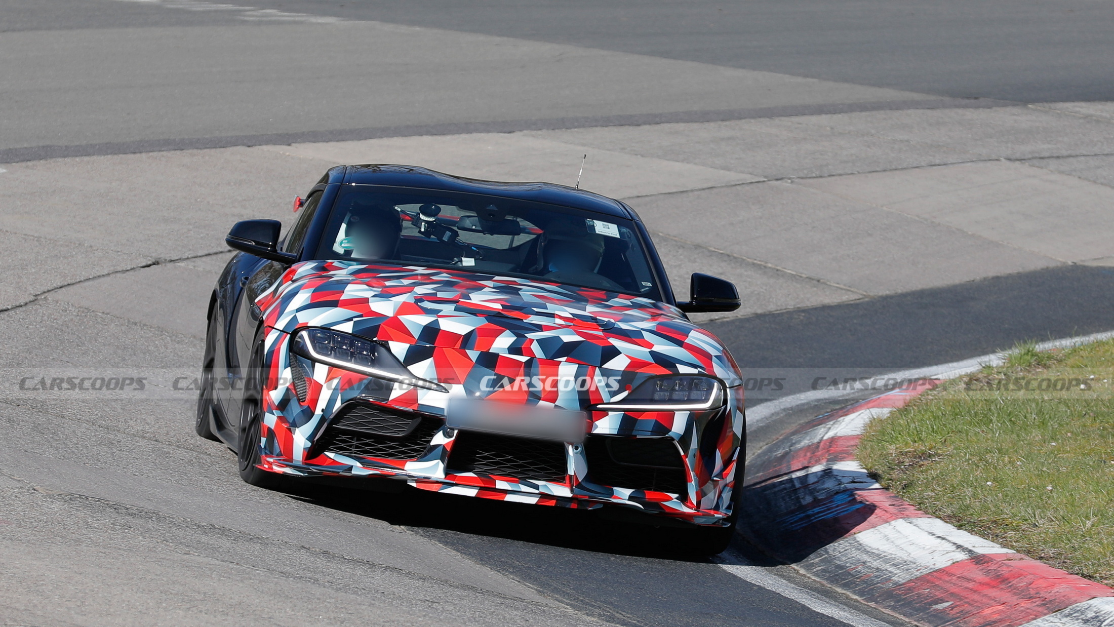 2025 Toyota Supra GRMN Spotted With New Hood, Upgraded Wing | Carscoops