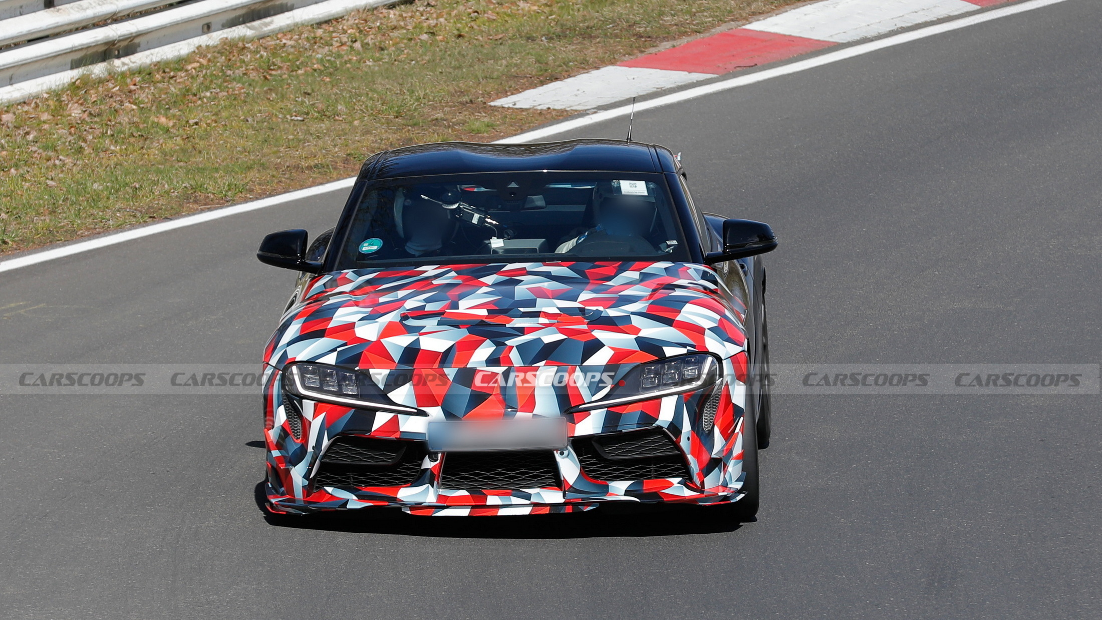 2025 Toyota Supra GRMN Spotted With New Hood, Upgraded Wing | Carscoops