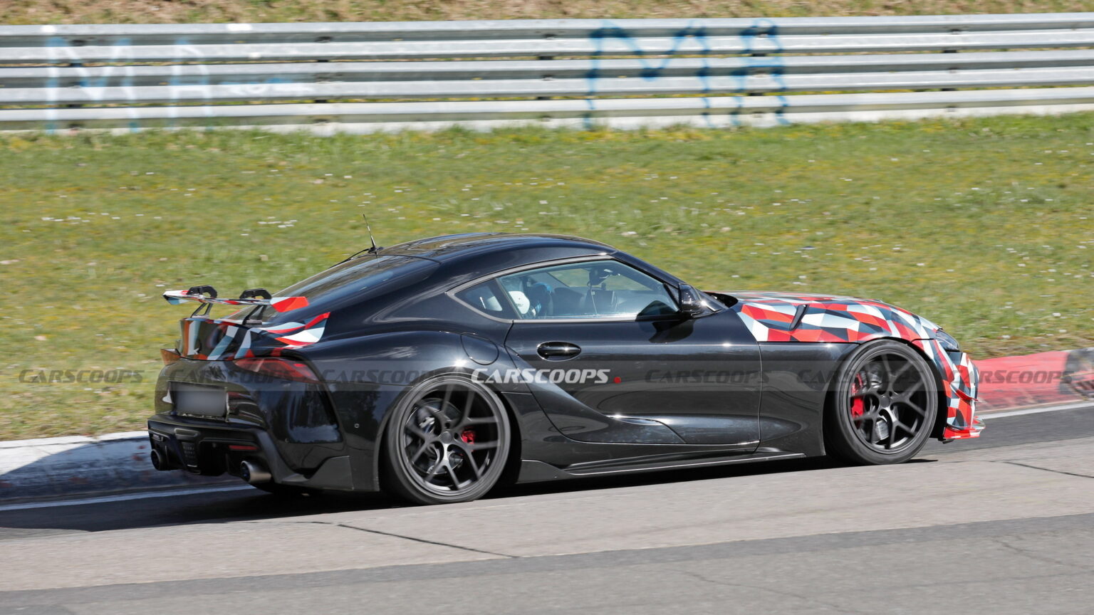 2025 Toyota Supra GRMN Spotted With New Hood, Upgraded Wing | Carscoops