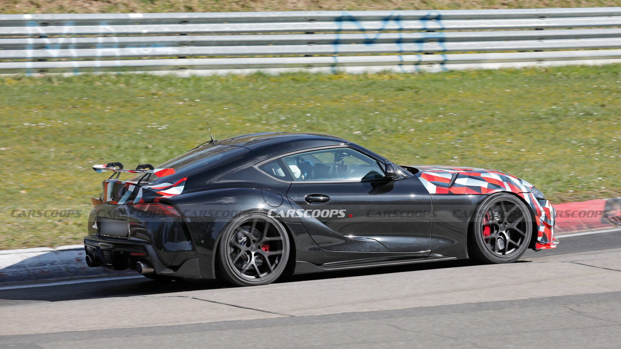 2025 Toyota Supra GRMN Spotted With New Hood, Upgraded Wing | Carscoops