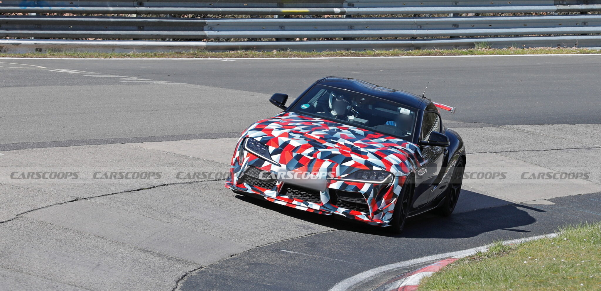 2025 Toyota Supra GRMN Spotted With New Hood, Upgraded Wing | Carscoops