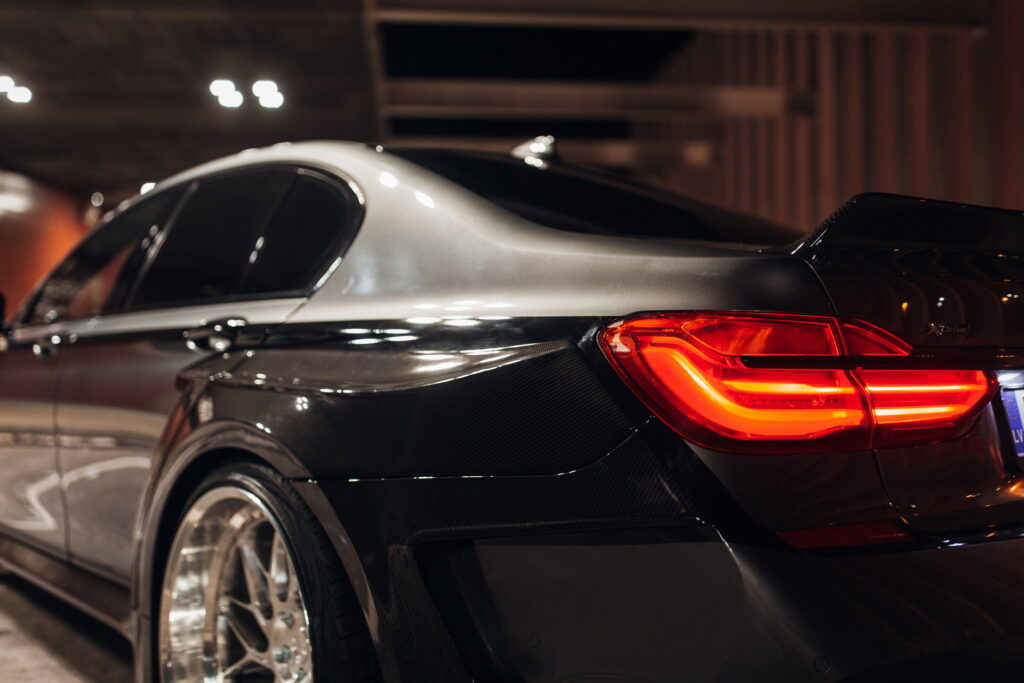 BMW G11 7-Series Tries On A Carbon Fiber WideBody Kit And 22-Inch Wheels | Carscoops