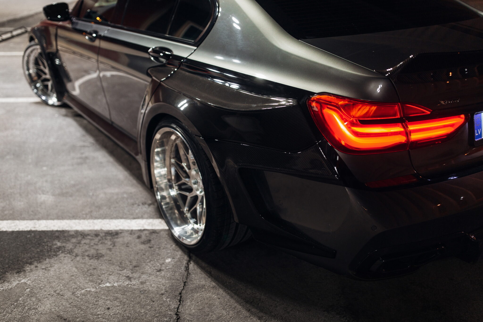 BMW G11 7-Series Tries On A Carbon Fiber WideBody Kit And 22-Inch Wheels | Carscoops
