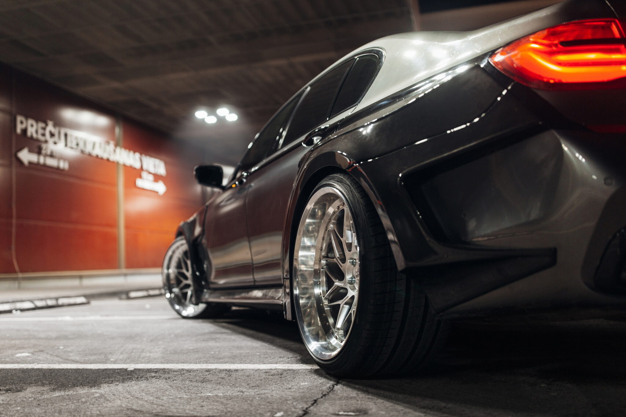 BMW G11 7-Series Tries On A Carbon Fiber WideBody Kit And 22-Inch Wheels | Carscoops