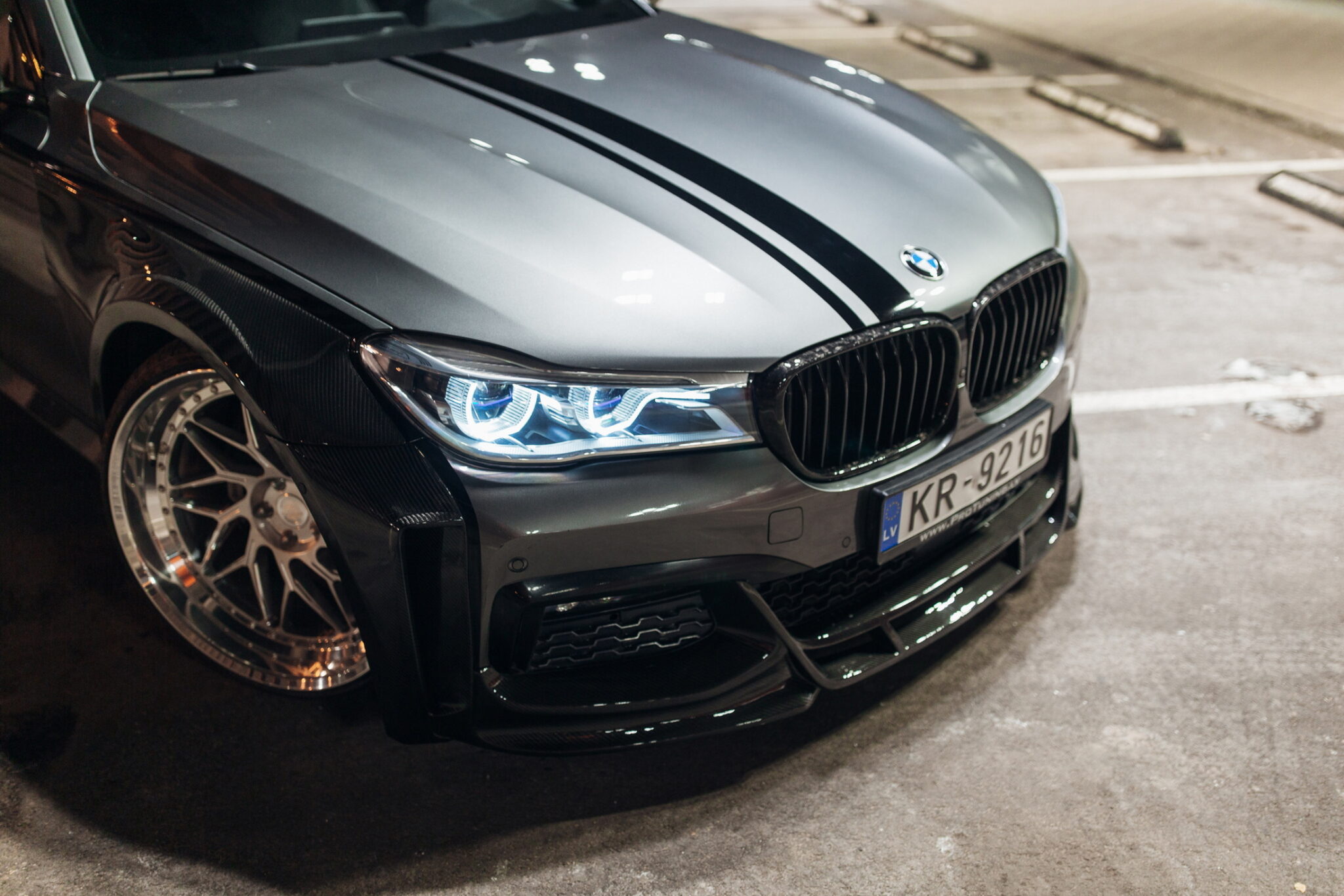 BMW G11 7-Series Tries On A Carbon Fiber WideBody Kit And 22-Inch Wheels | Carscoops